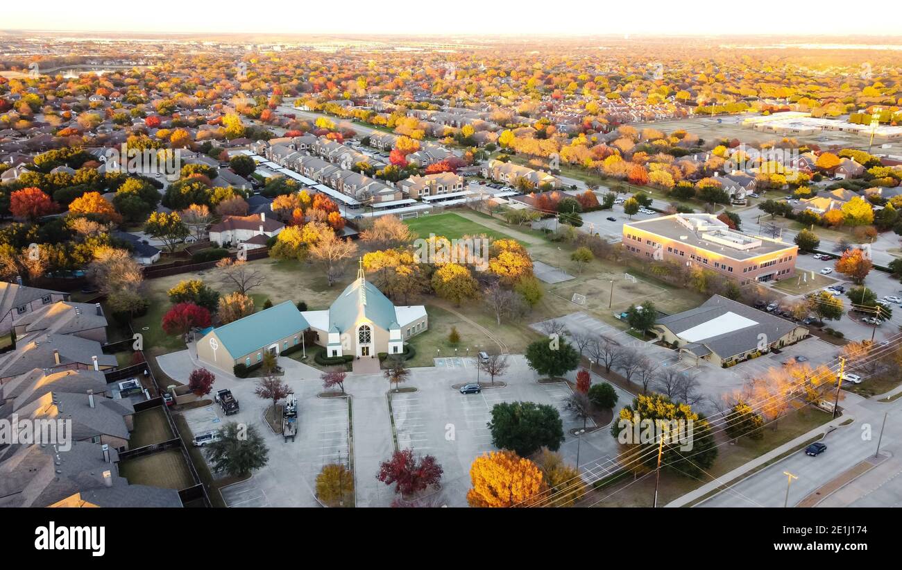 Top view new development houses with church and subdivision sprawl in ...