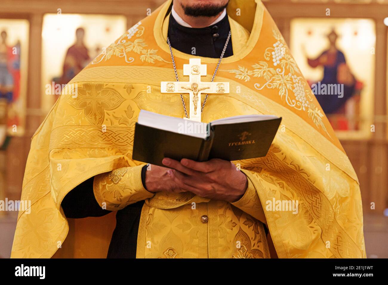 Orthodox Church. Christianity. Priest hands holding Holy Bible book in ...