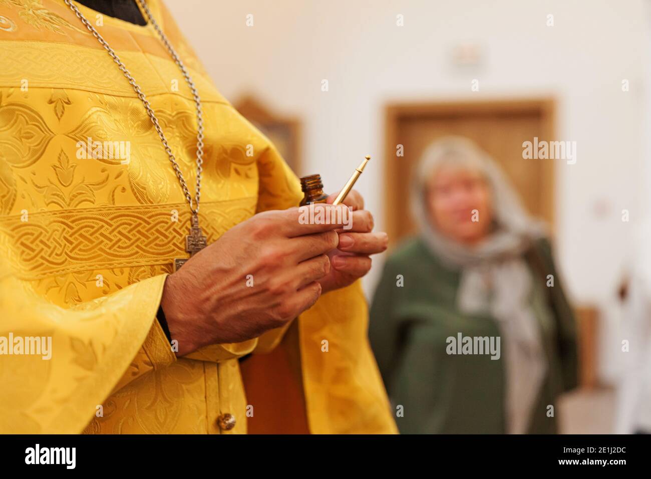 Orthodox Church. Christianity. Priest hands holding oil for anointing ...