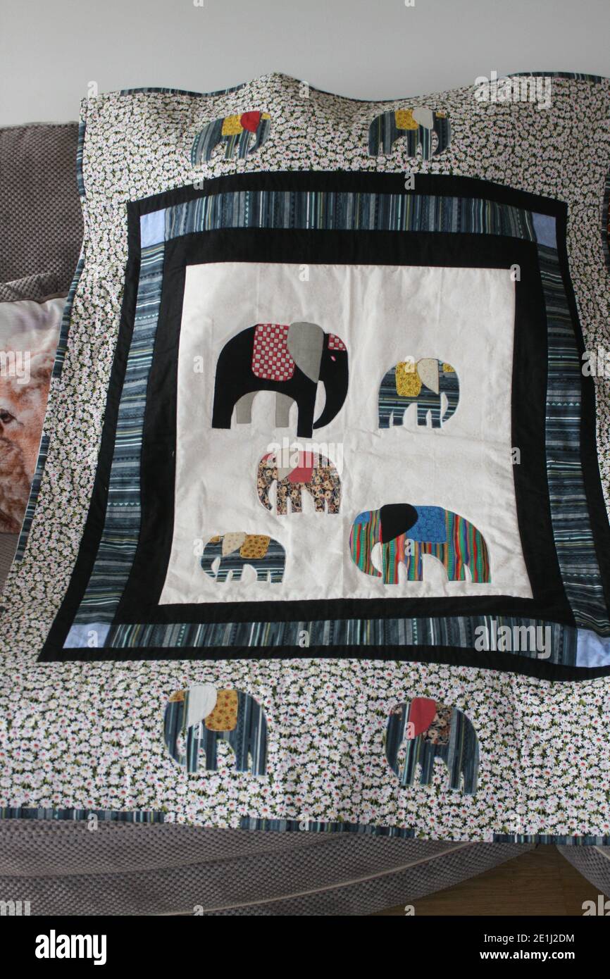 Colourful elephant motif quilt Stock Photo - Alamy