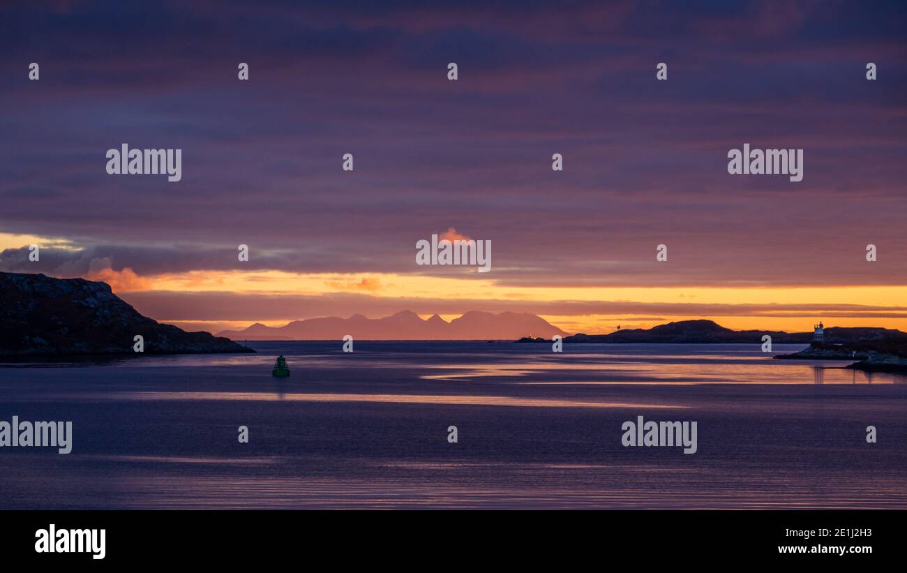 Stunning sunrise over Loch Boisdale in South Uist, Outer Hebrides with ...