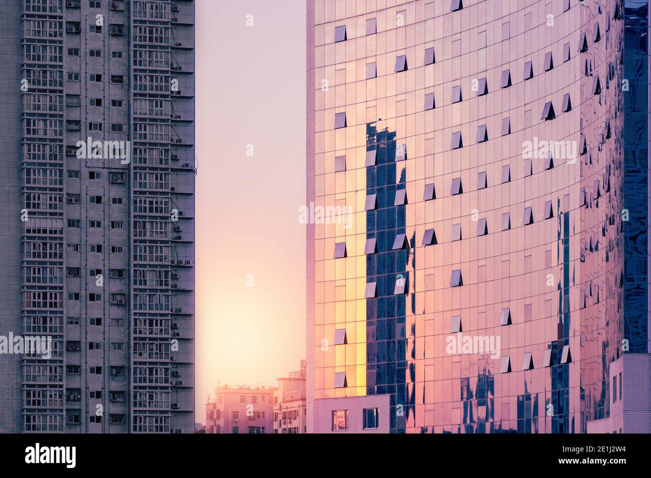 Luxury corporate building at sunset against the background of a gray ...