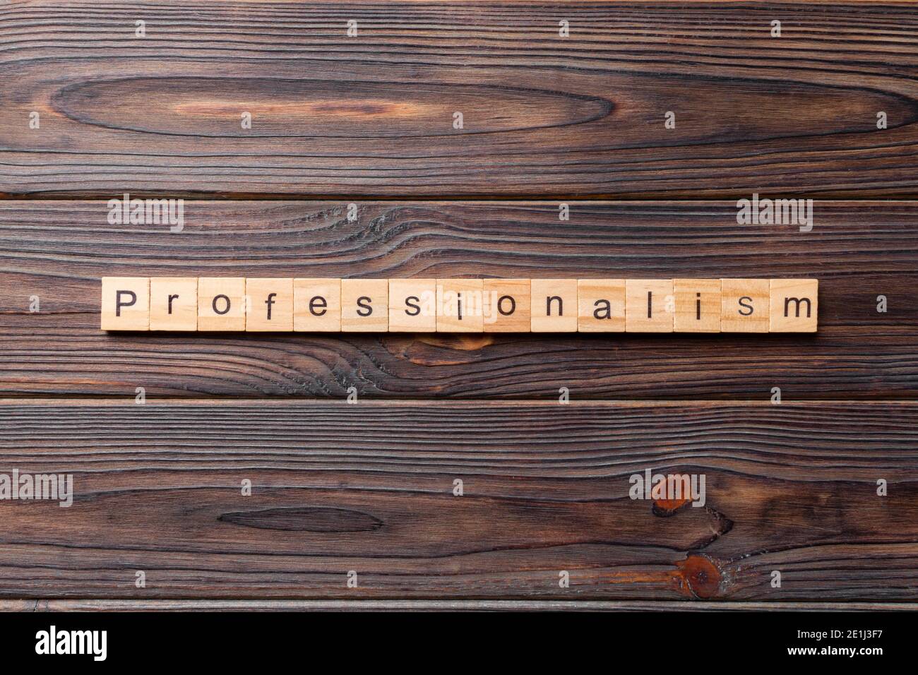 Professionalism word written on wood block. Professionalism text on ...
