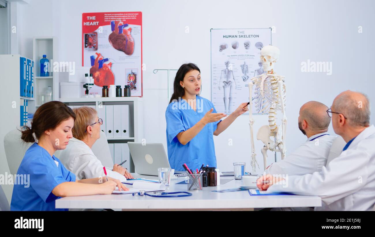 Doctor describing layout human spine hi-res stock photography and ...