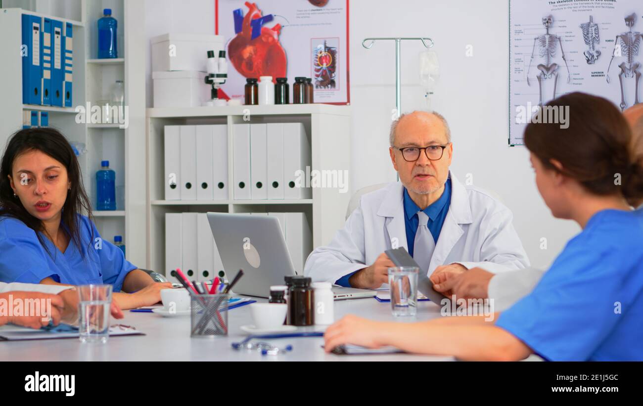 Specialist doctor presenting research informations hi-res stock ...