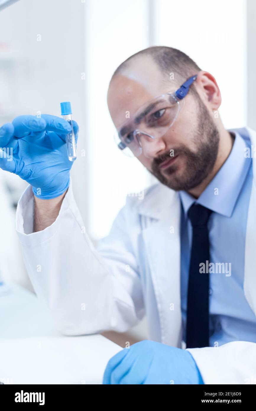 Male researcher wearing lab hi-res stock photography and images - Alamy