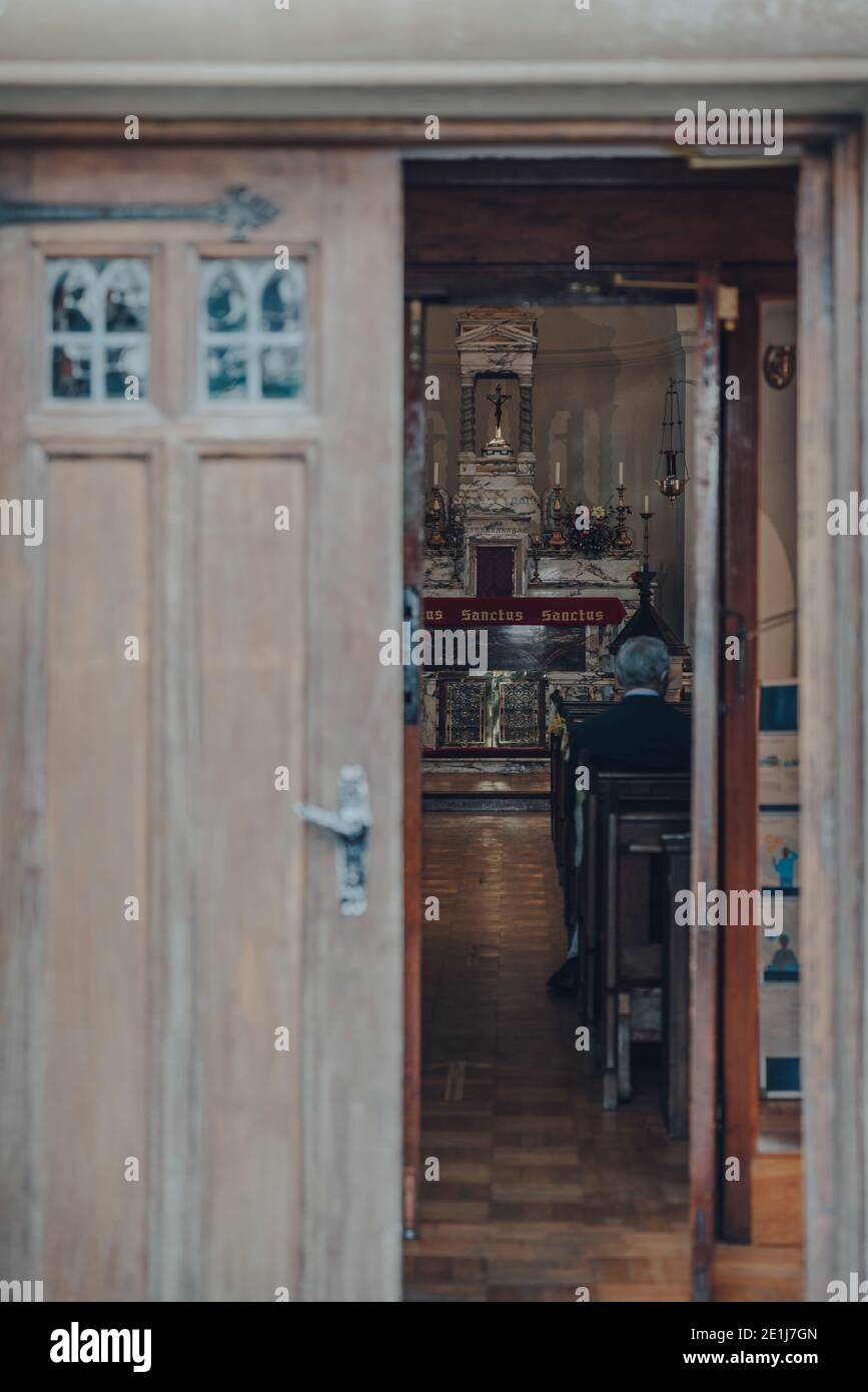 Rye, UK - October 10, 2020: View through the door frame of altar inside ...
