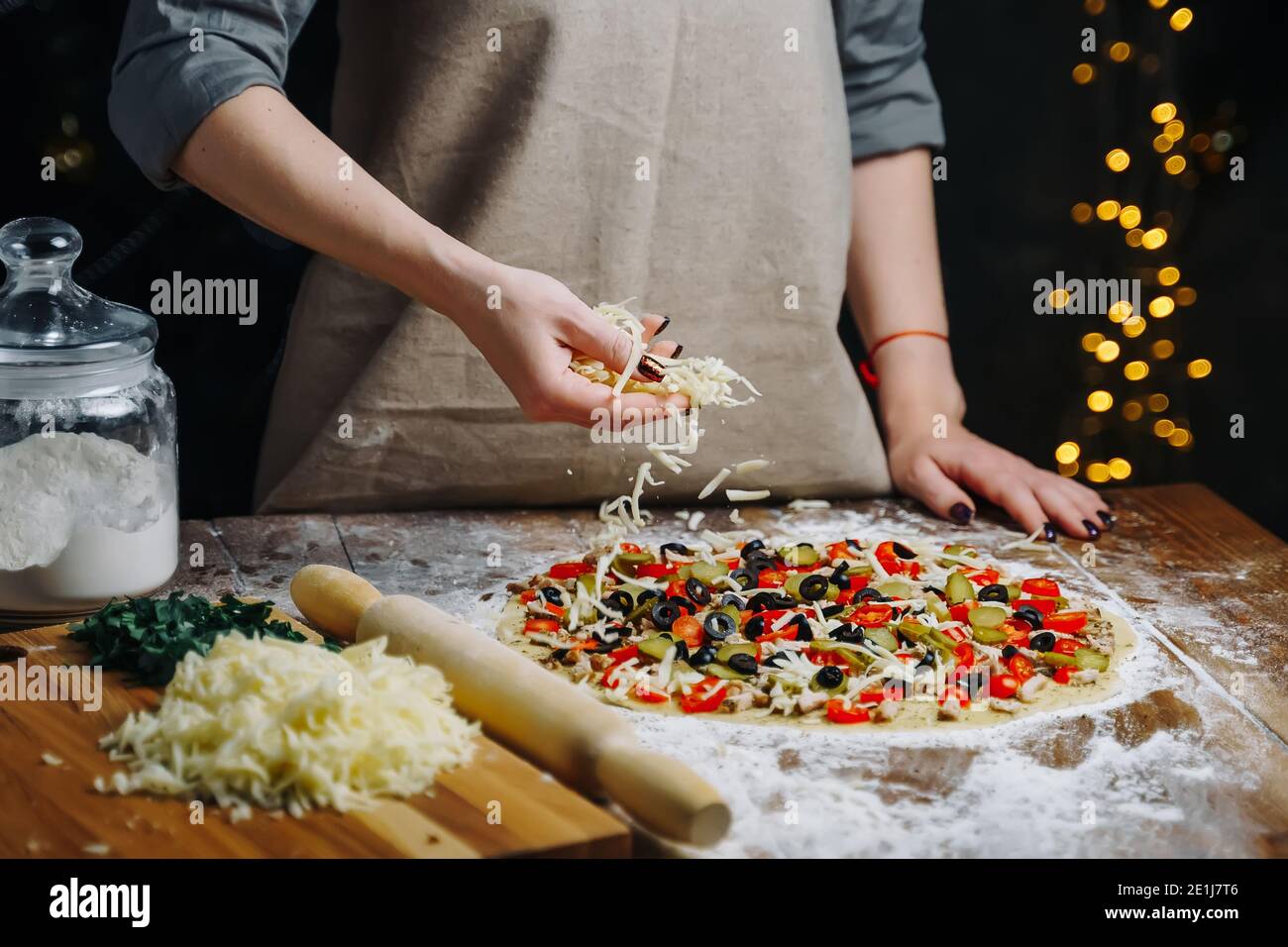 Woman pouring dough cheese hi-res stock photography and images - Alamy