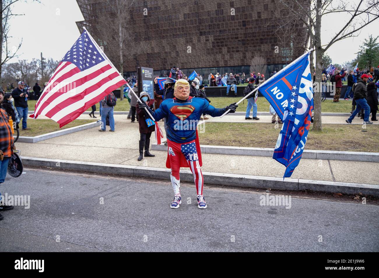 A trump supporter is seen wearing a Superman costume with US President ...