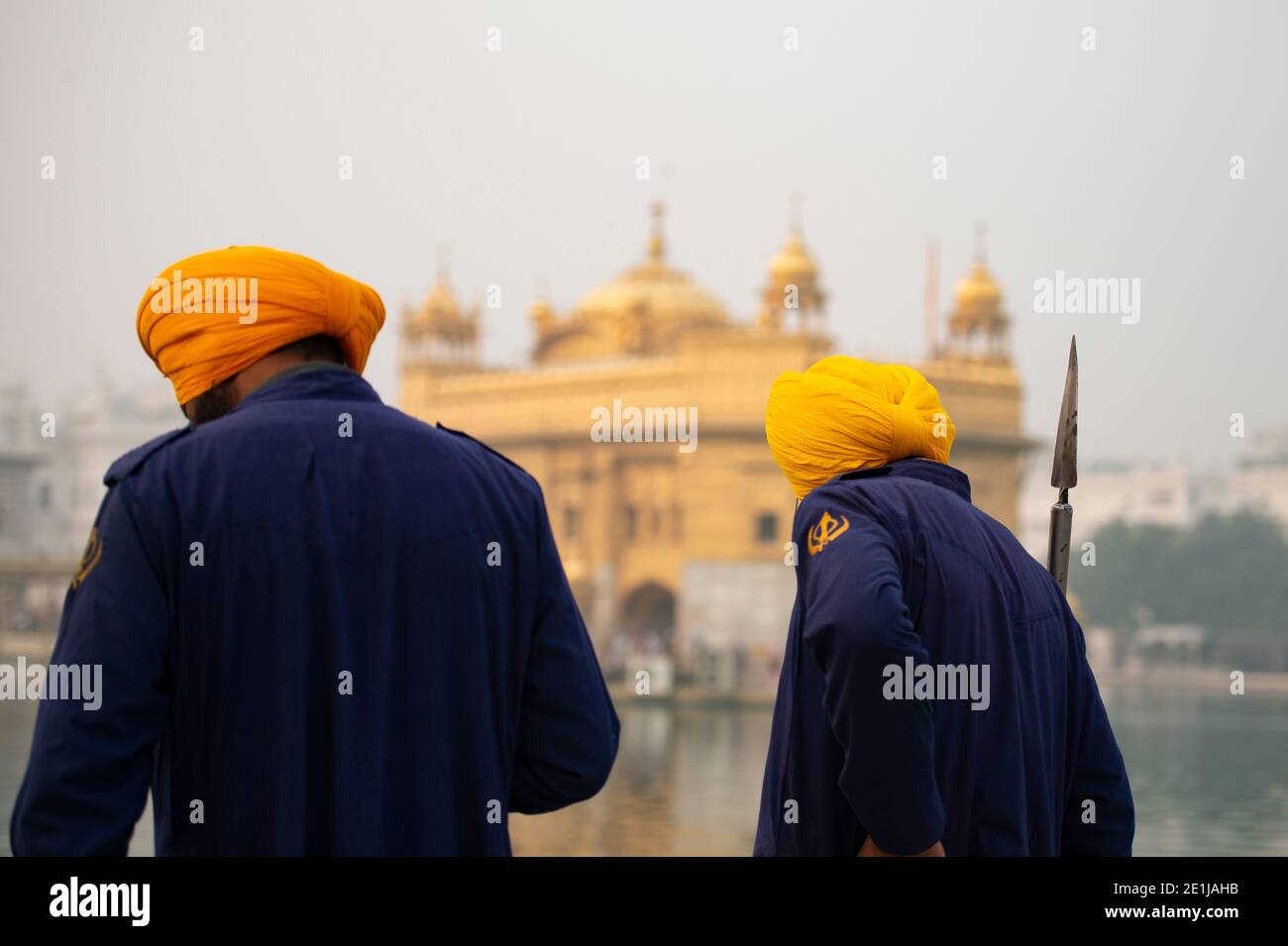 (Selective focus) Two security guards, wearing the Dastar, are walking ...