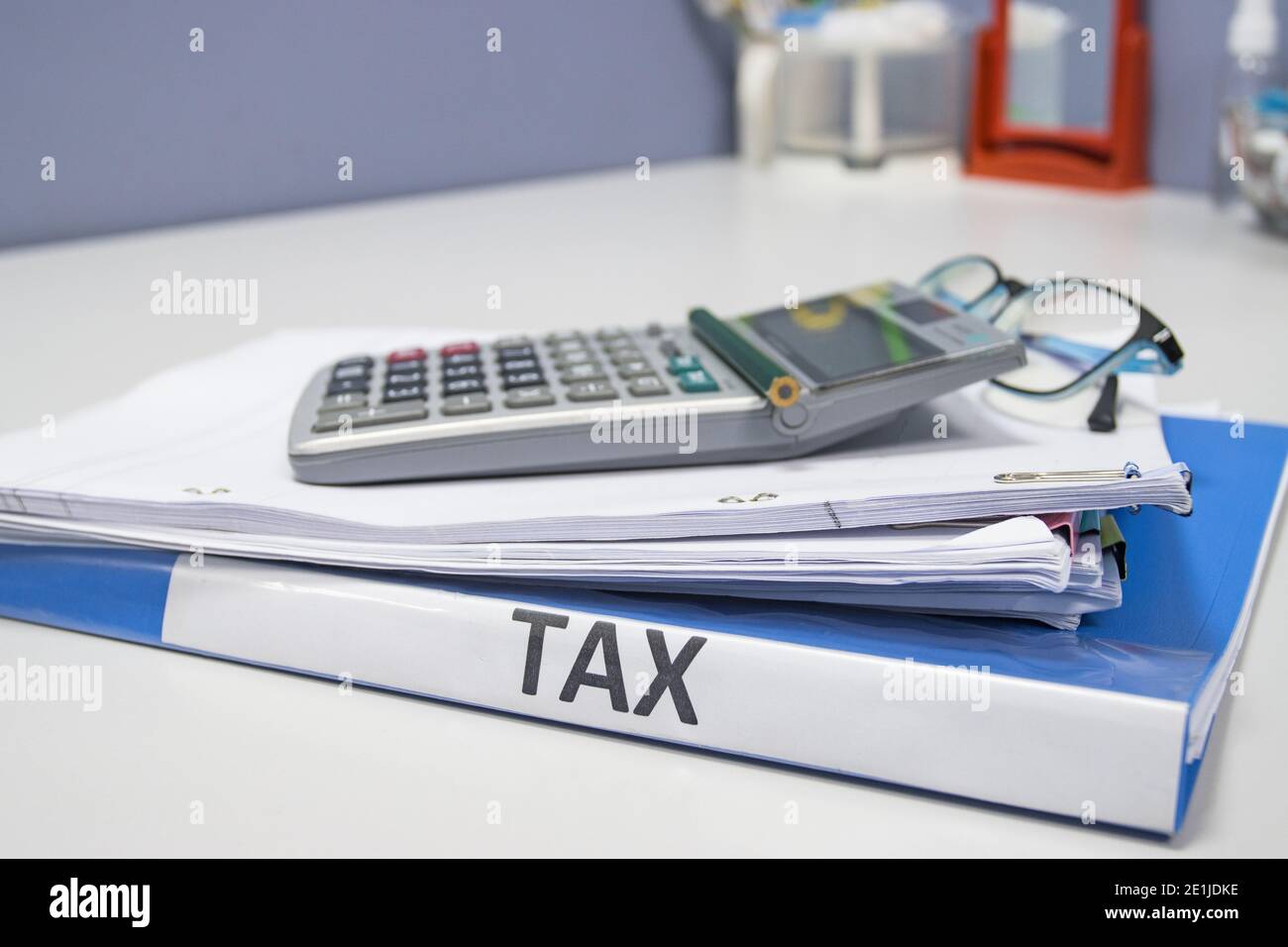 Folder Tax documents and paper files concept Annual tax payment Stock ...