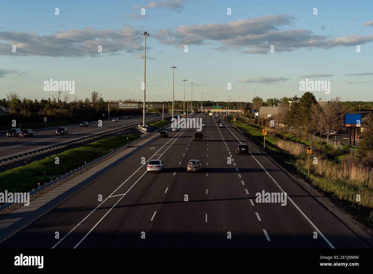Highway top view from pedestrian pathway, golden light creating deep ...