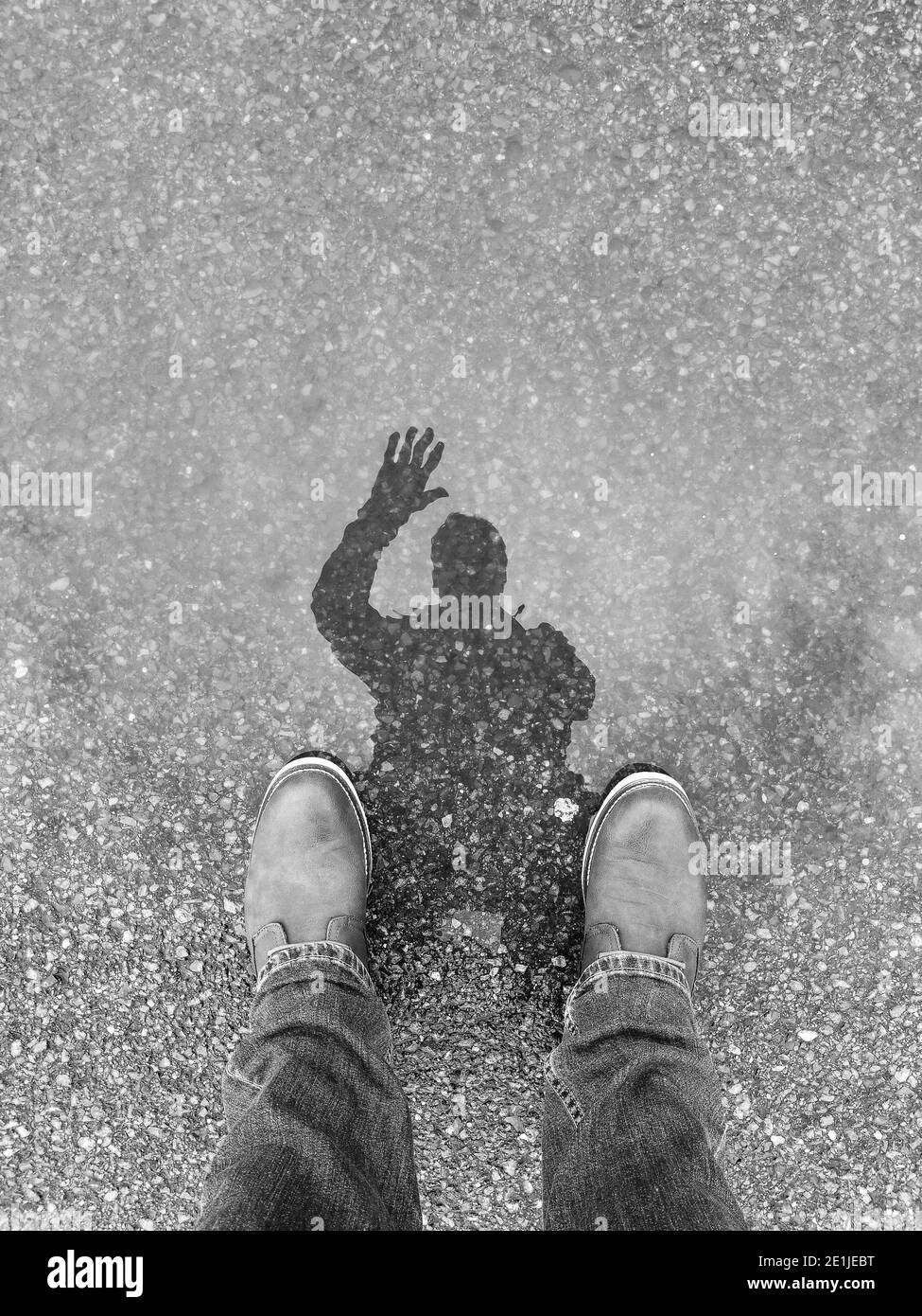 Shoes reflection standing in water Black and White Stock Photos ...