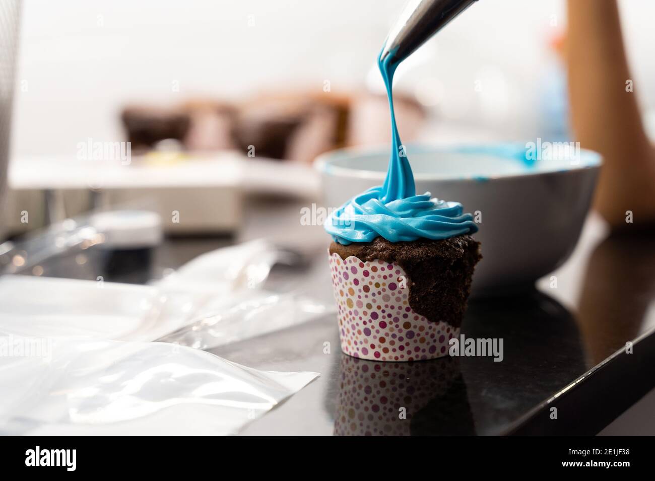Adding frosting hi-res stock photography and images - Alamy
