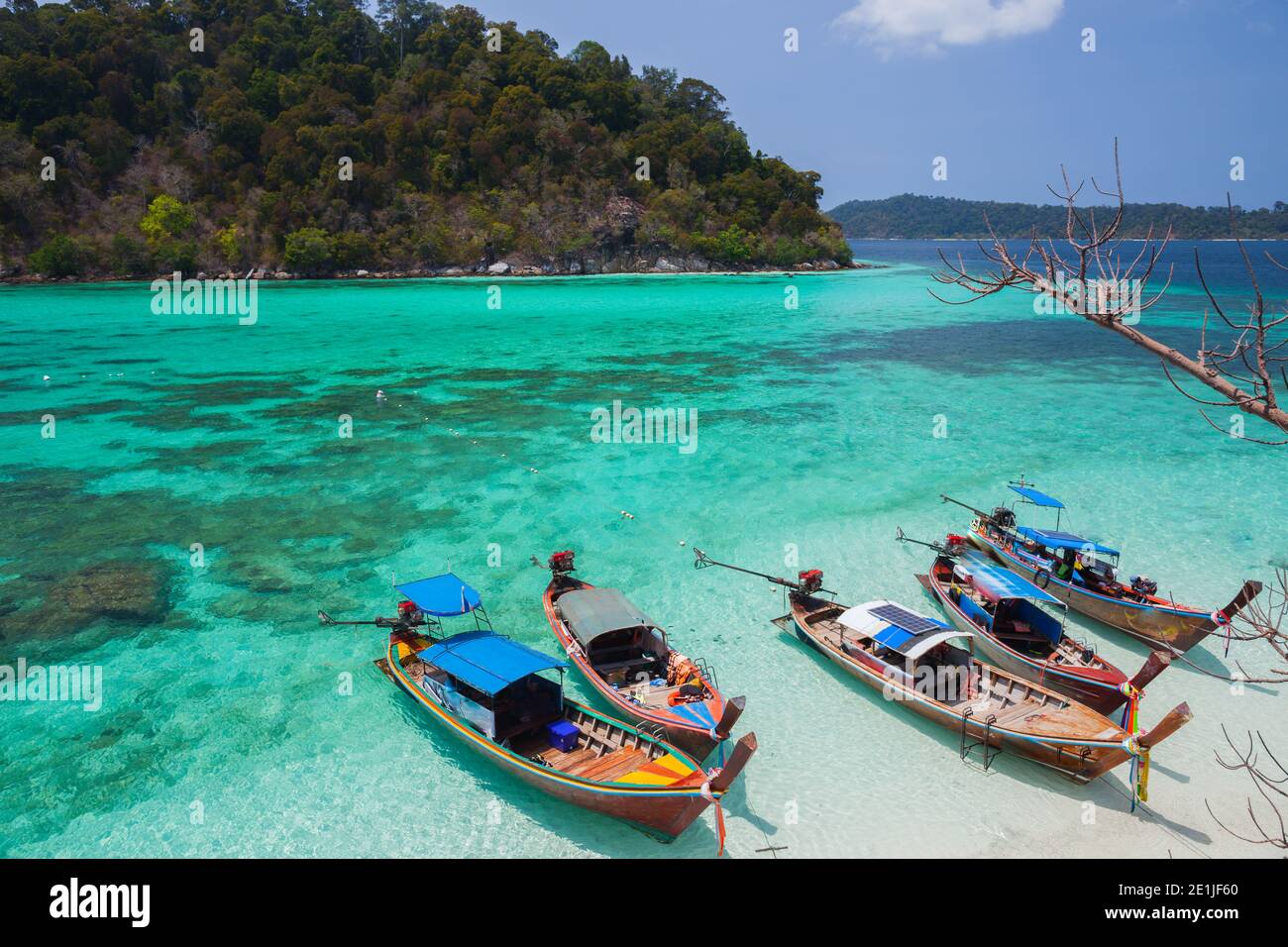 boats are floating on beach againts sky Stock Photo - Alamy