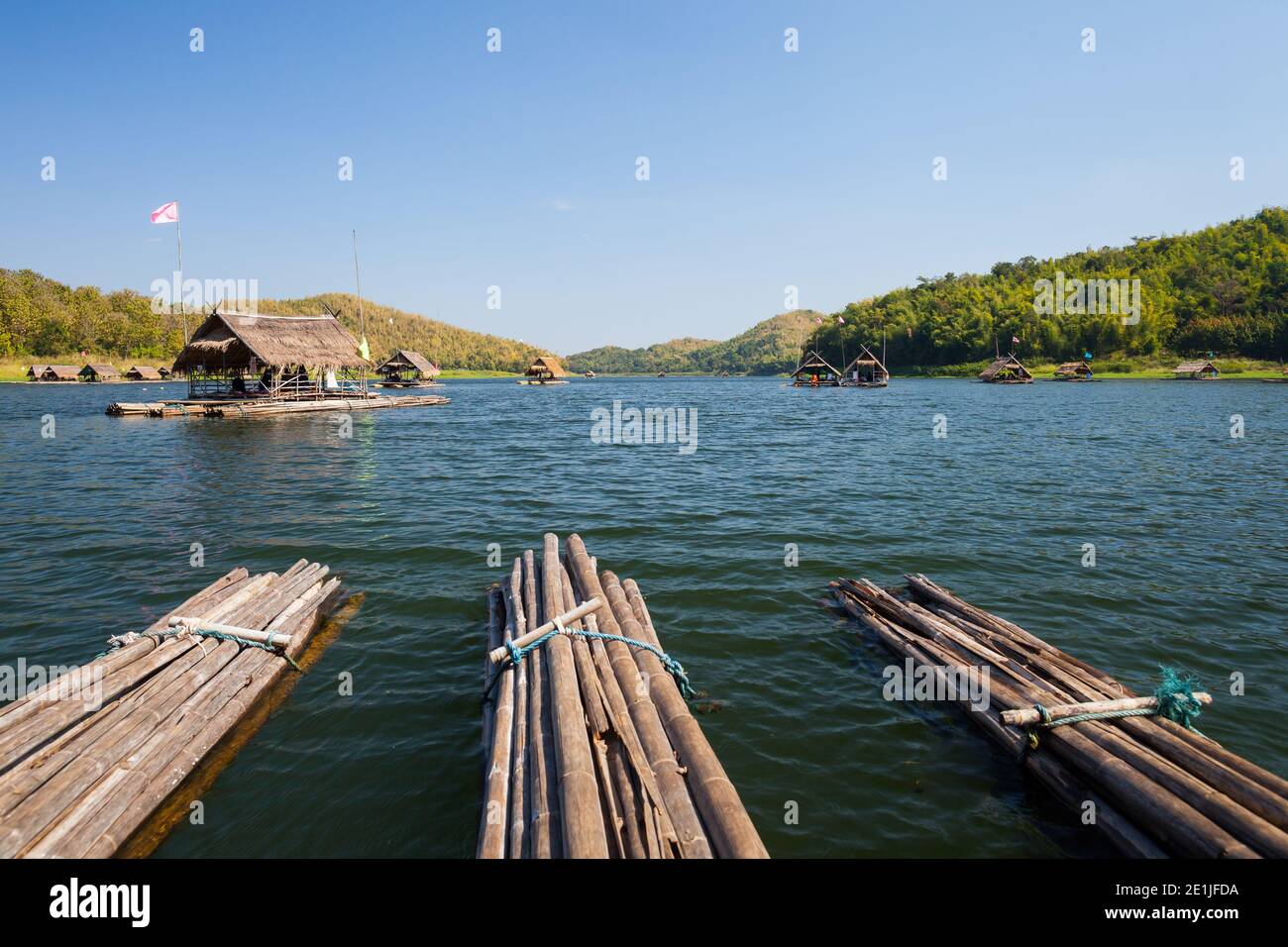 Bamboo raft floating on water in dam Stock Photo - Alamy