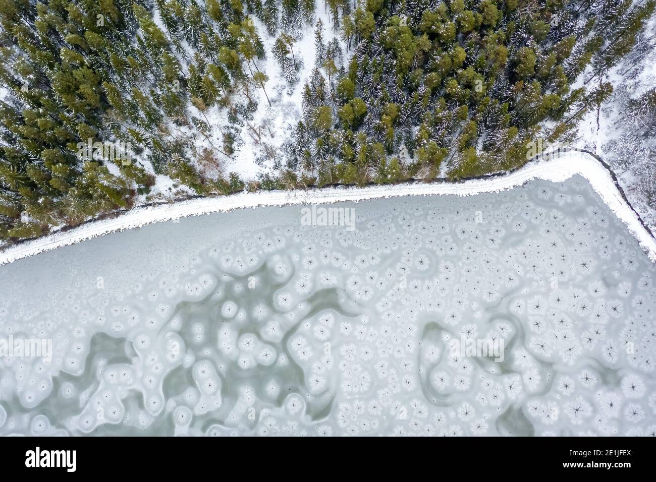 Flight above frozen lake forest hi-res stock photography and images - Alamy