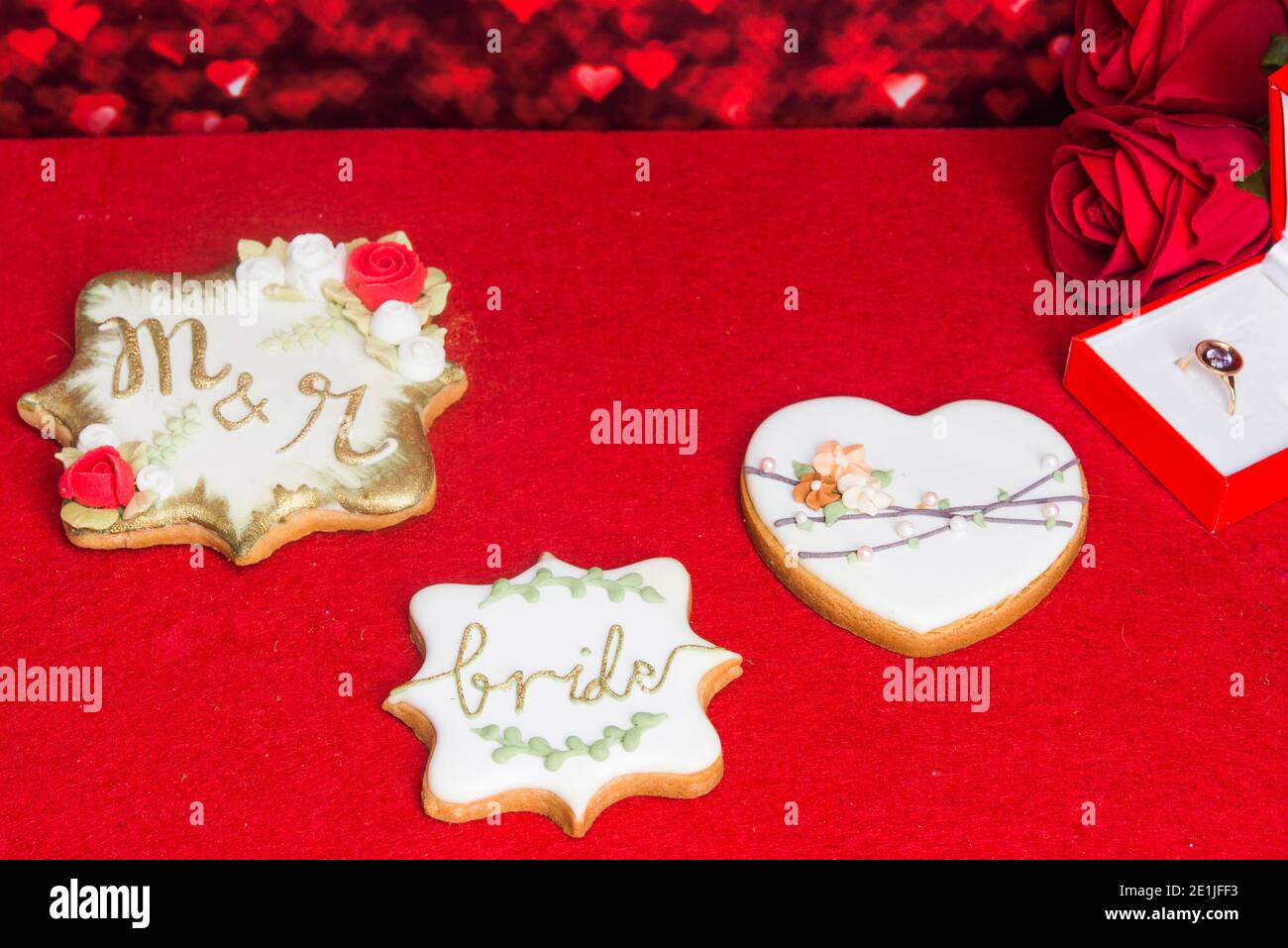 Engagment background (ring, flowers, red background Stock Photo - Alamy