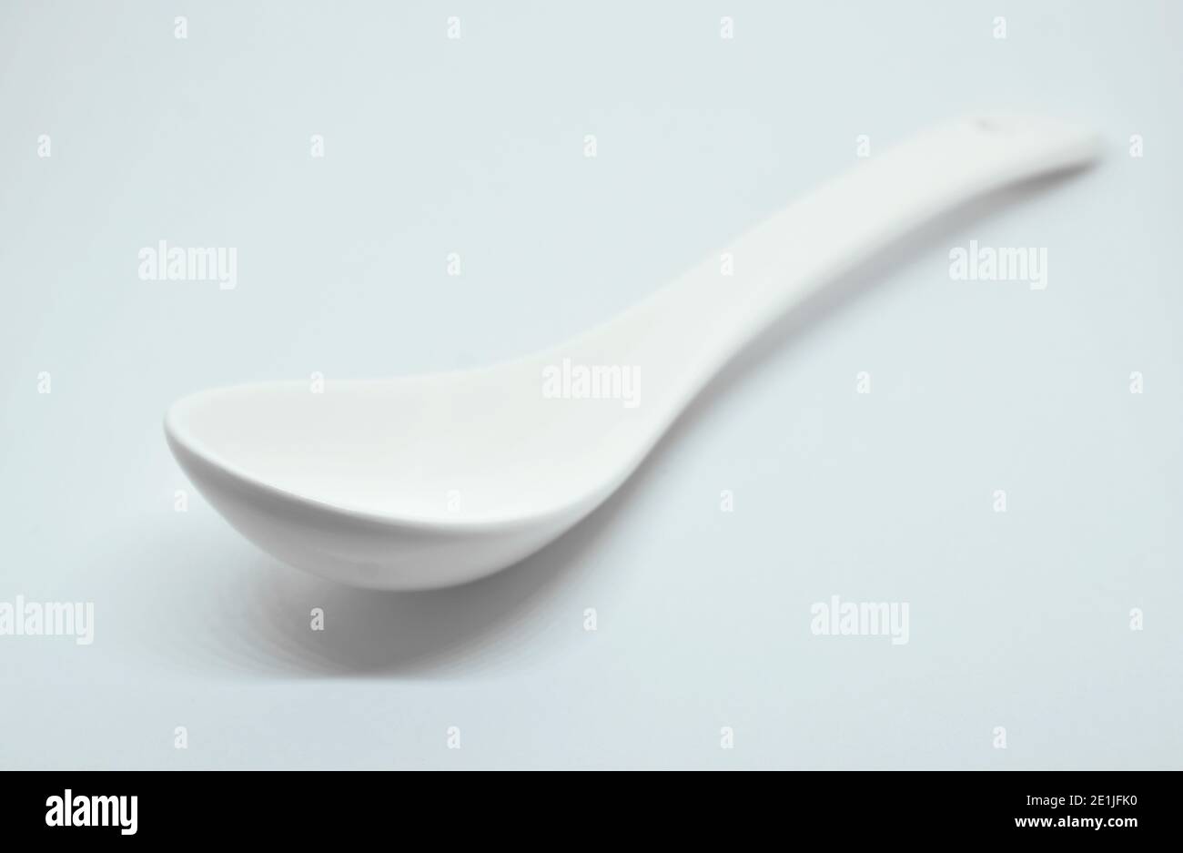 melamine spoon arranging on white background Stock Photo - Alamy