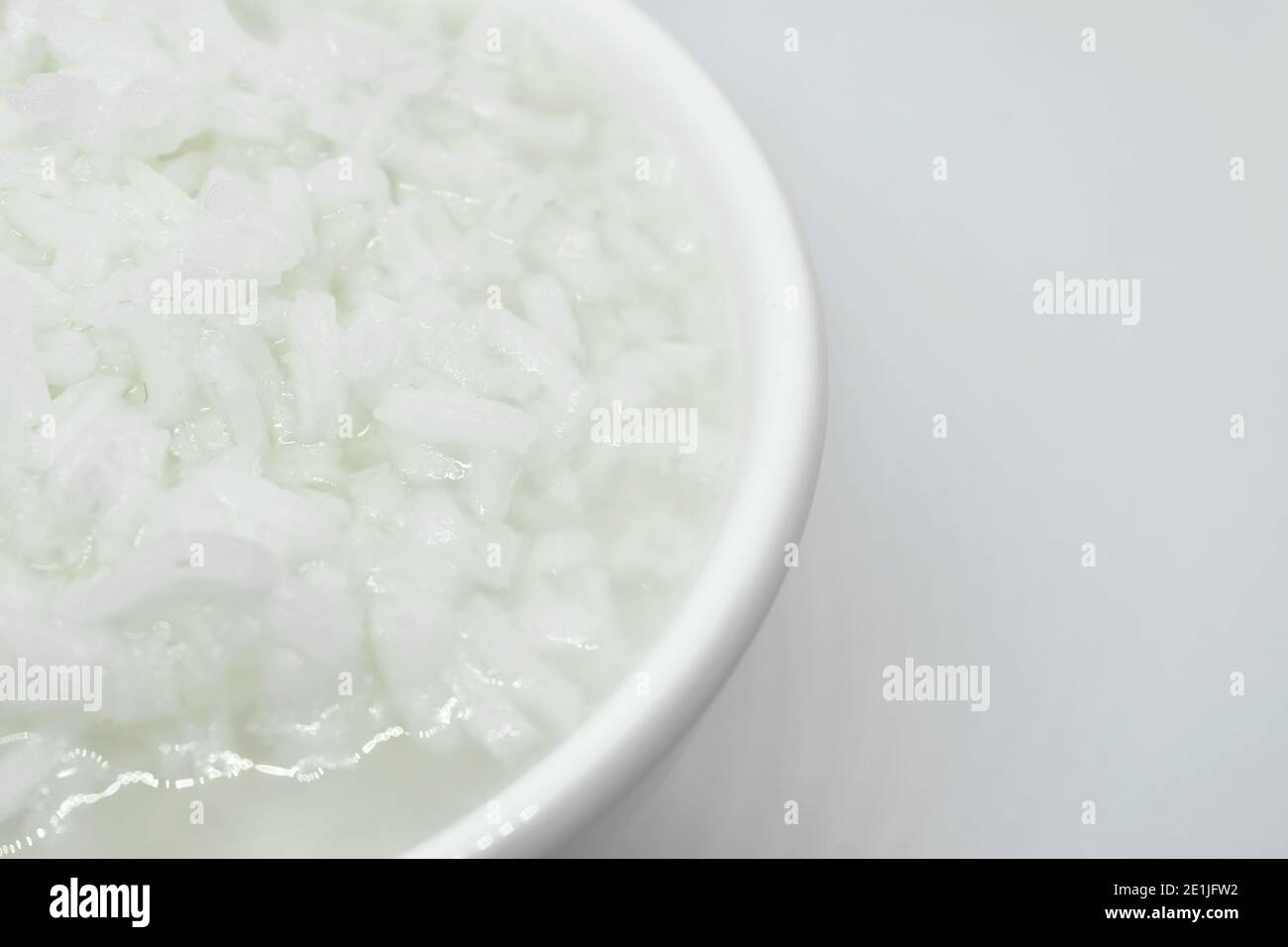 Boiled rice in cup hi-res stock photography and images - Alamy