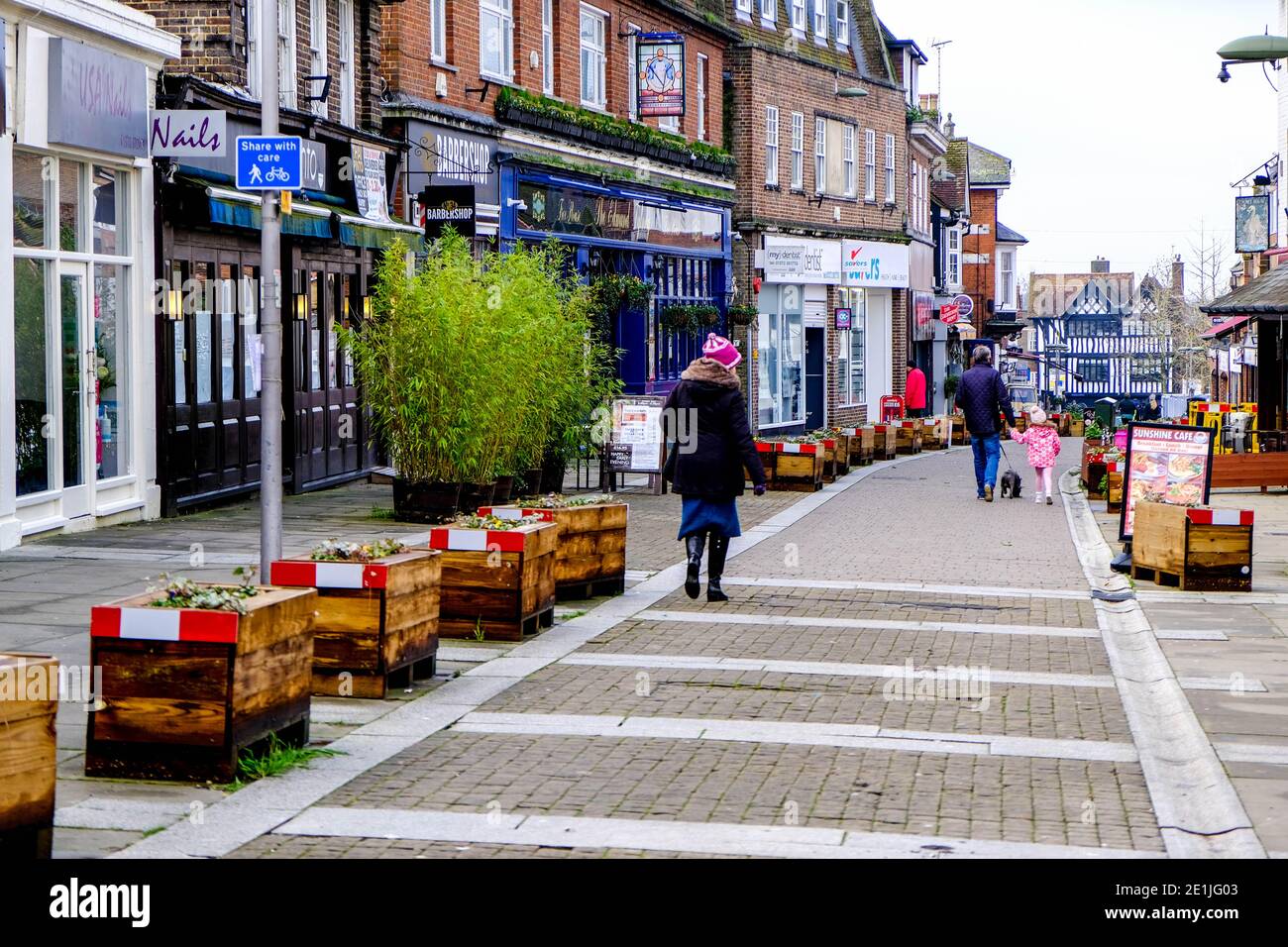 Leatherhead Surrey, London UK January 07 2021, Family Walking Dog Along ...