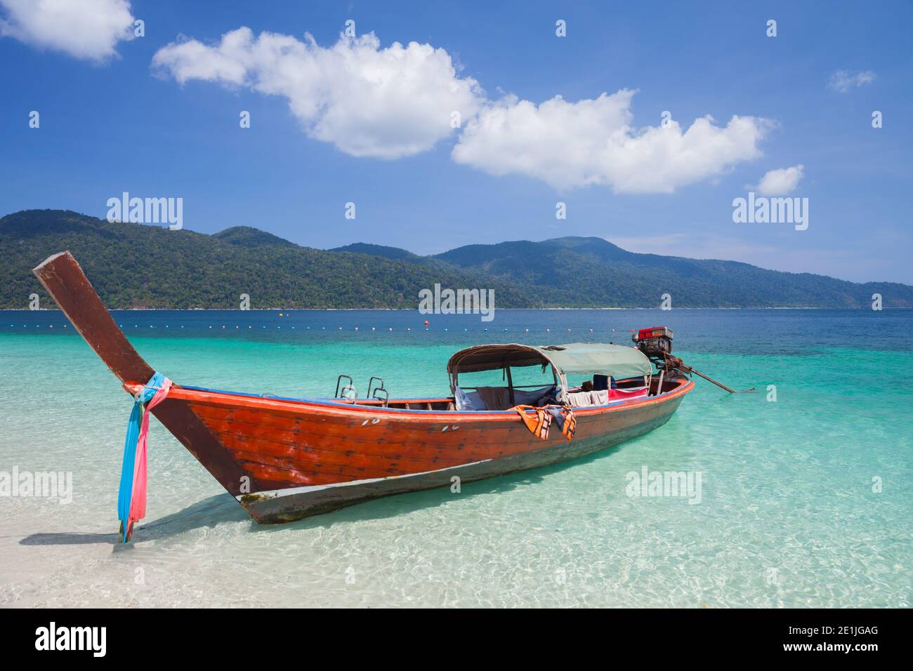 boats are floating on beach againts sky Stock Photo - Alamy