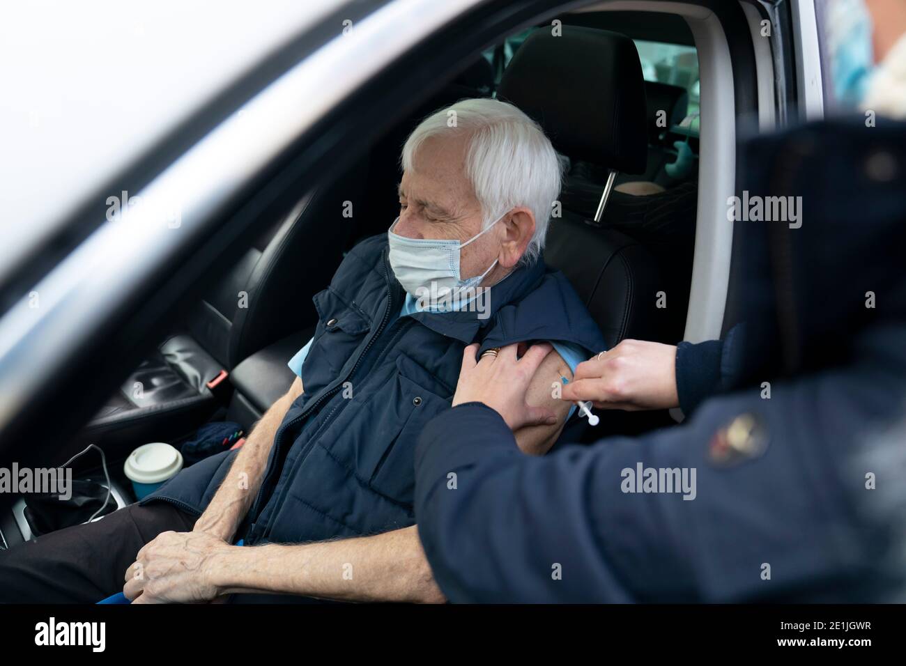 Greater Manchester, Britain. 7th Jan, 2021. A man receives the second ...