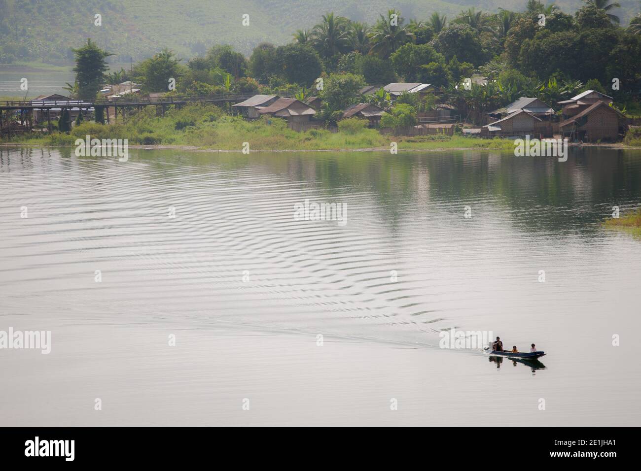 Boat moving across long green hi-res stock photography and images - Alamy