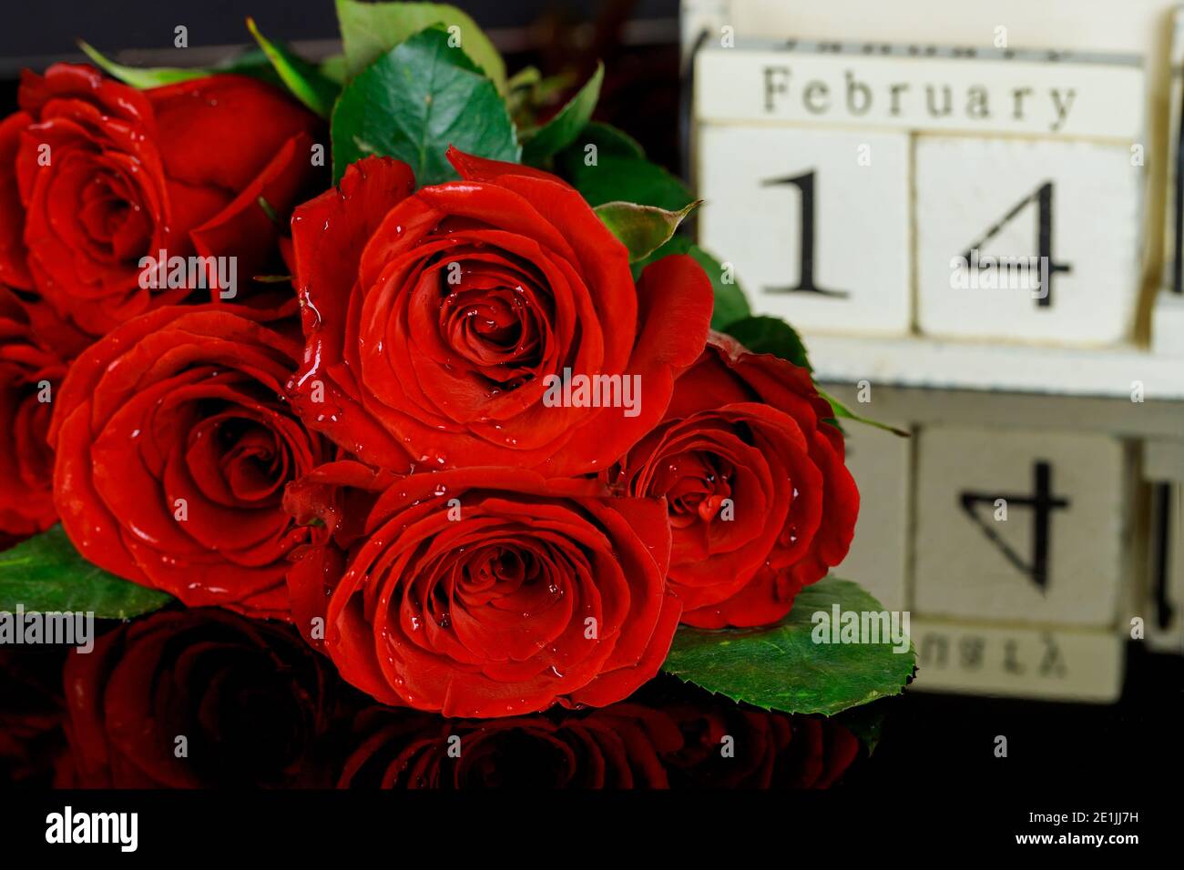 Romantic bouquet of beautiful red roses with calendar date February ...