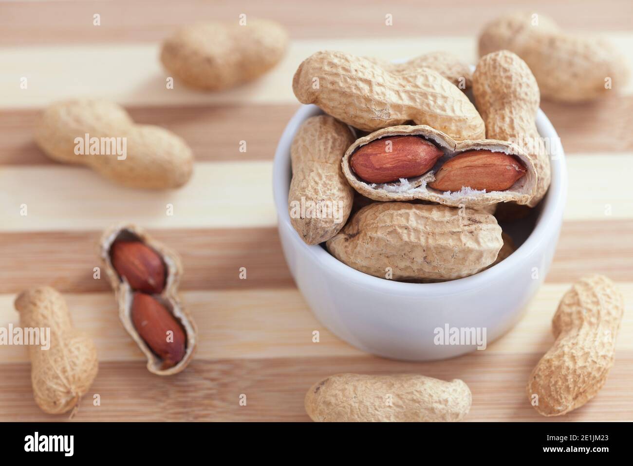 Peanuts in small white hi-res stock photography and images - Alamy