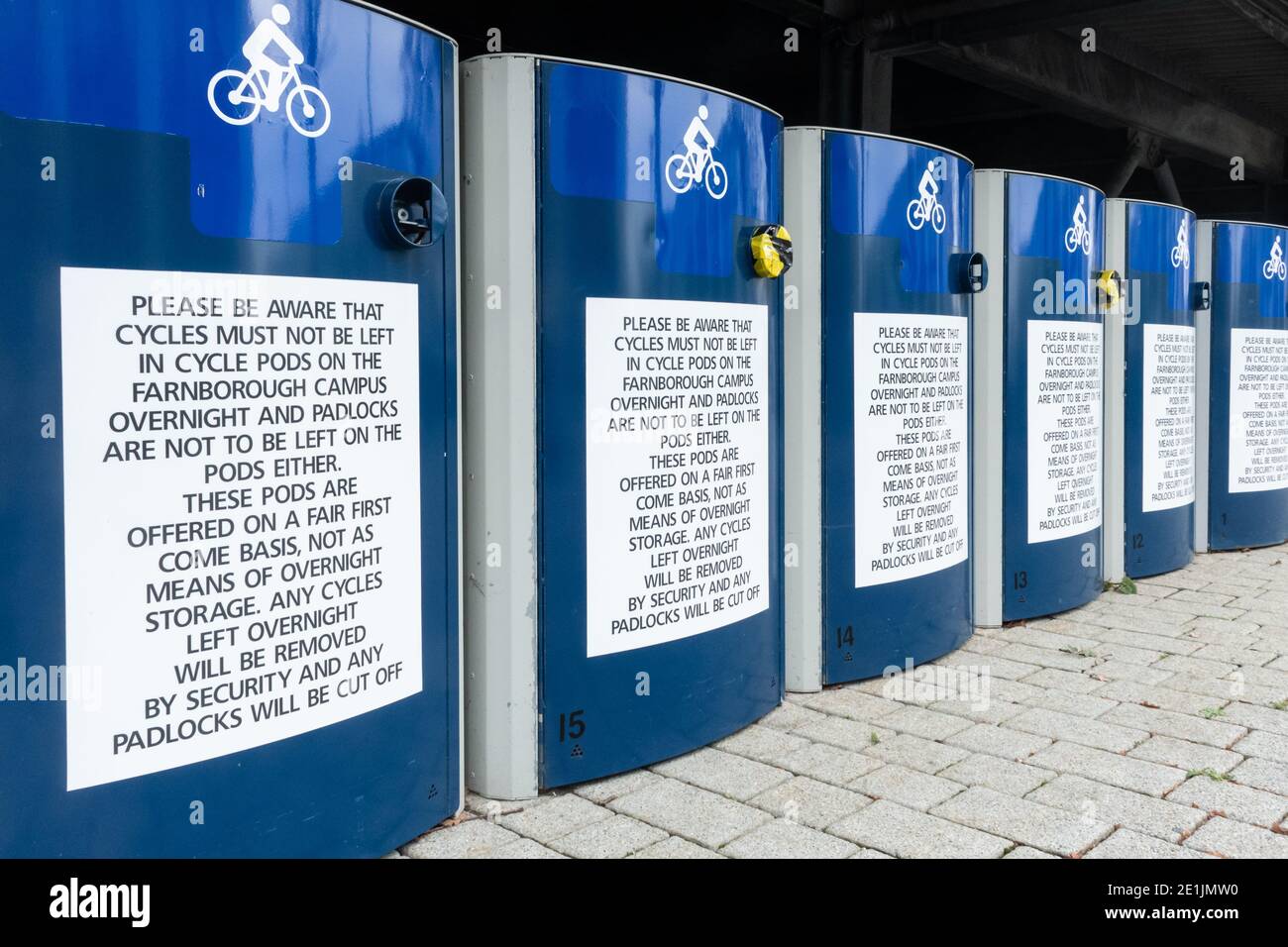 Row of cycle pods for storing bicycles during the working day at ...