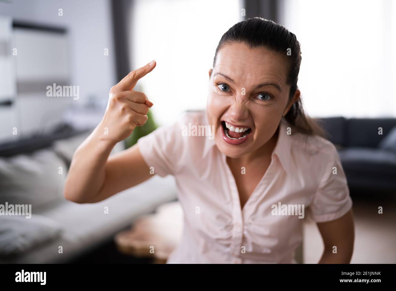 Angry looking woman hi-res stock photography and images - Alamy