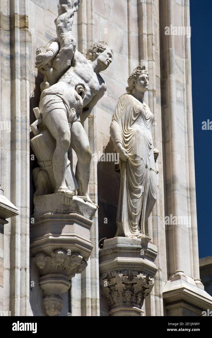 Sculptures of saints and Biblical figures on the facade of Milan ...