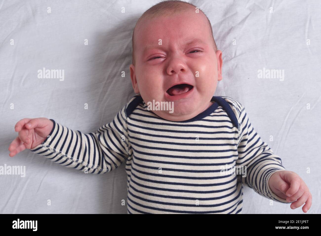 Crying inconsolably hi-res stock photography and images - Alamy