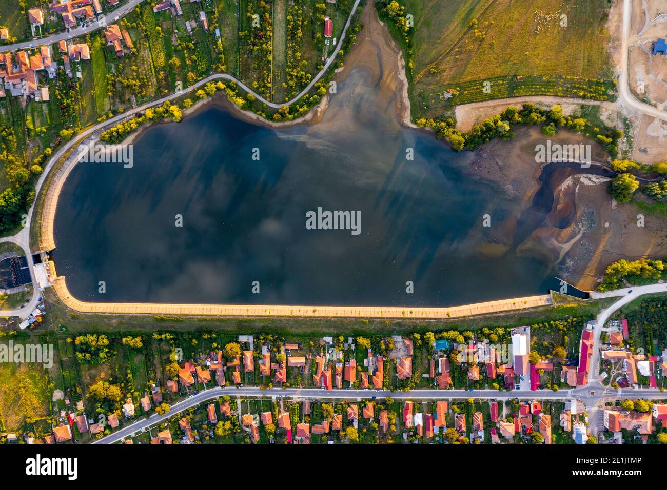 Beautiful Tismana lake and surrounding forest aerial panorama. Tismana ...