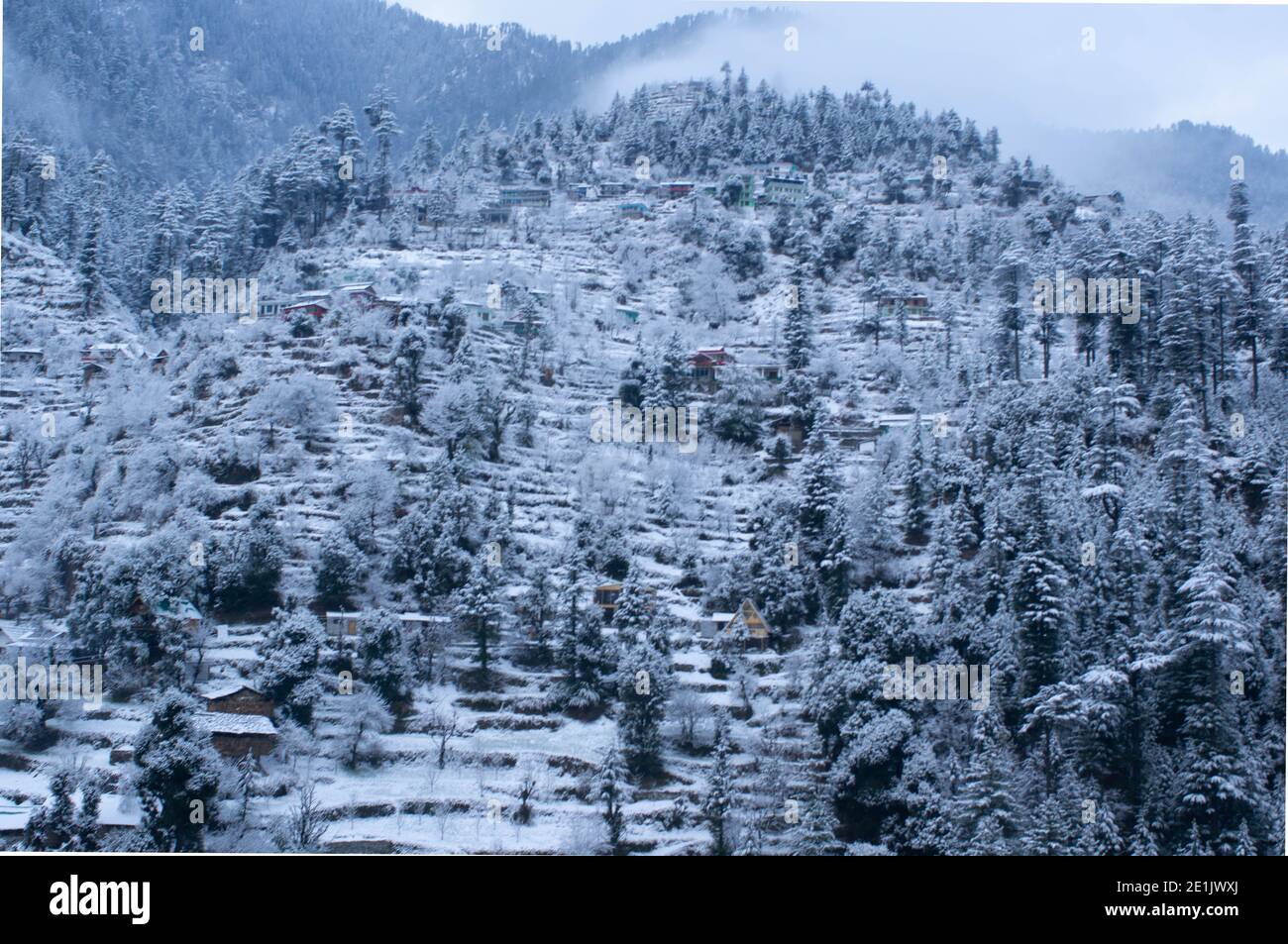 Photograph of fresh snow on the mountains Stock Photo - Alamy