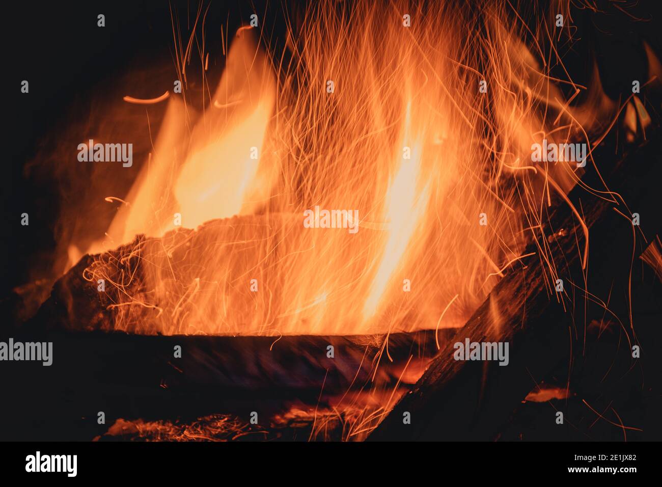 Wood is burning in fire. Fire for bushcraft and tourism at night gives ...