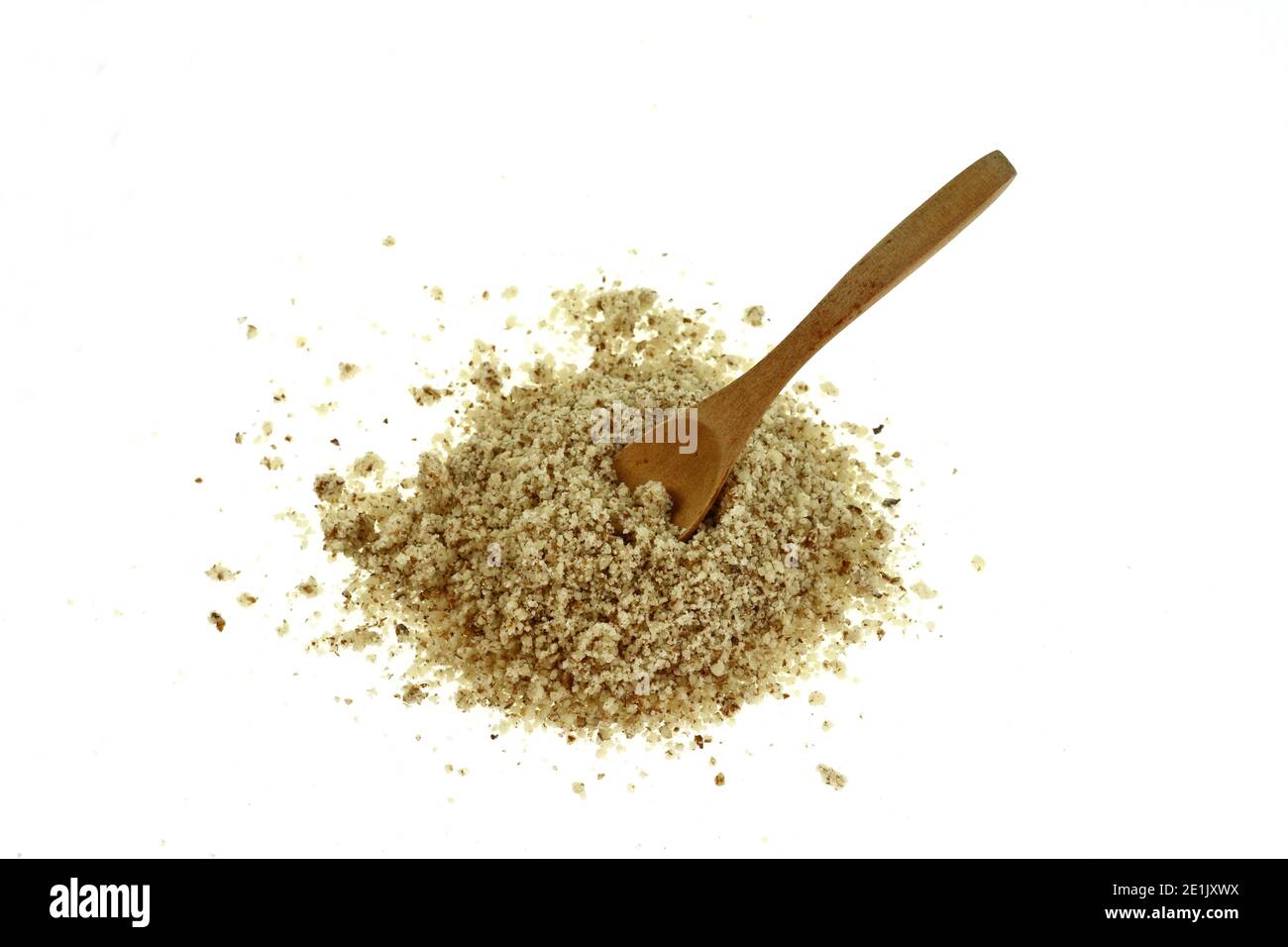 Ground walnuts powder on white. Chopped walnuts pile isolated on white ...