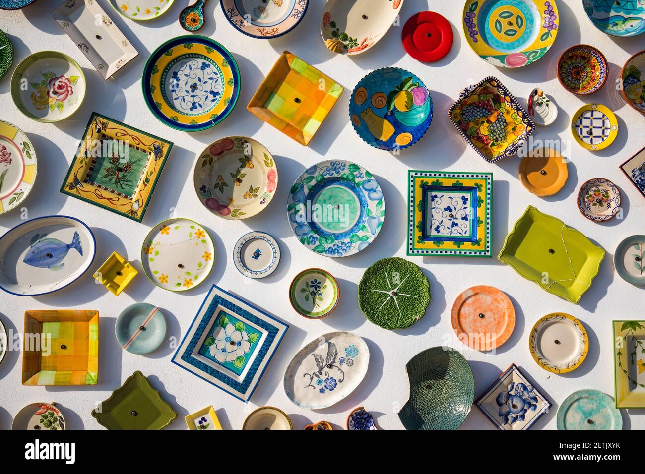 Collection of colorful Portuguese ceramic pottery, local craft products ...
