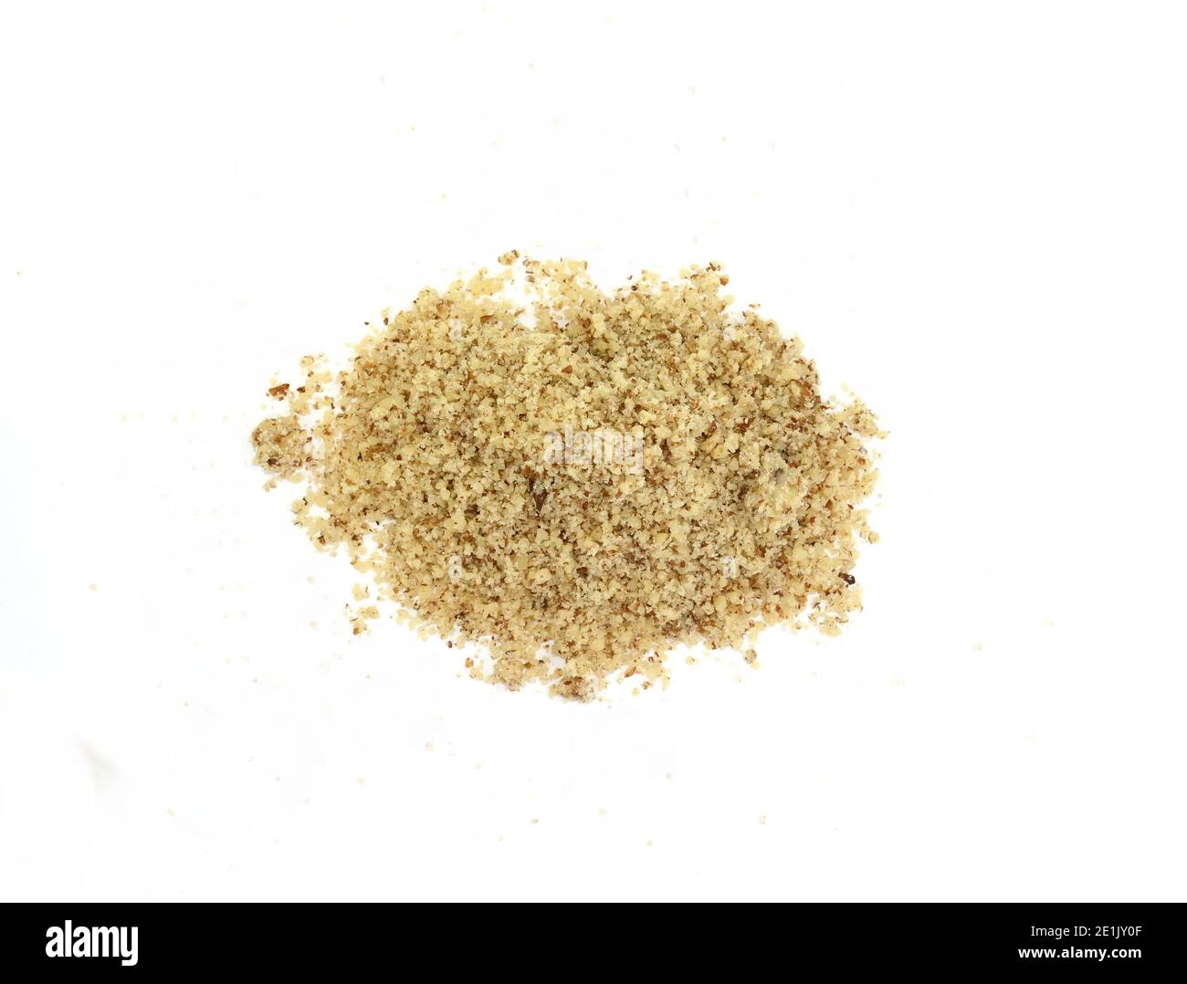Ground walnuts powder on white. Chopped walnuts pile isolated on white ...
