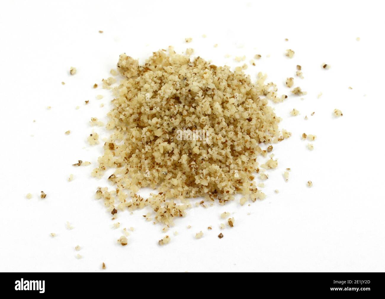 Ground walnuts powder on white. Chopped walnuts pile isolated on white ...