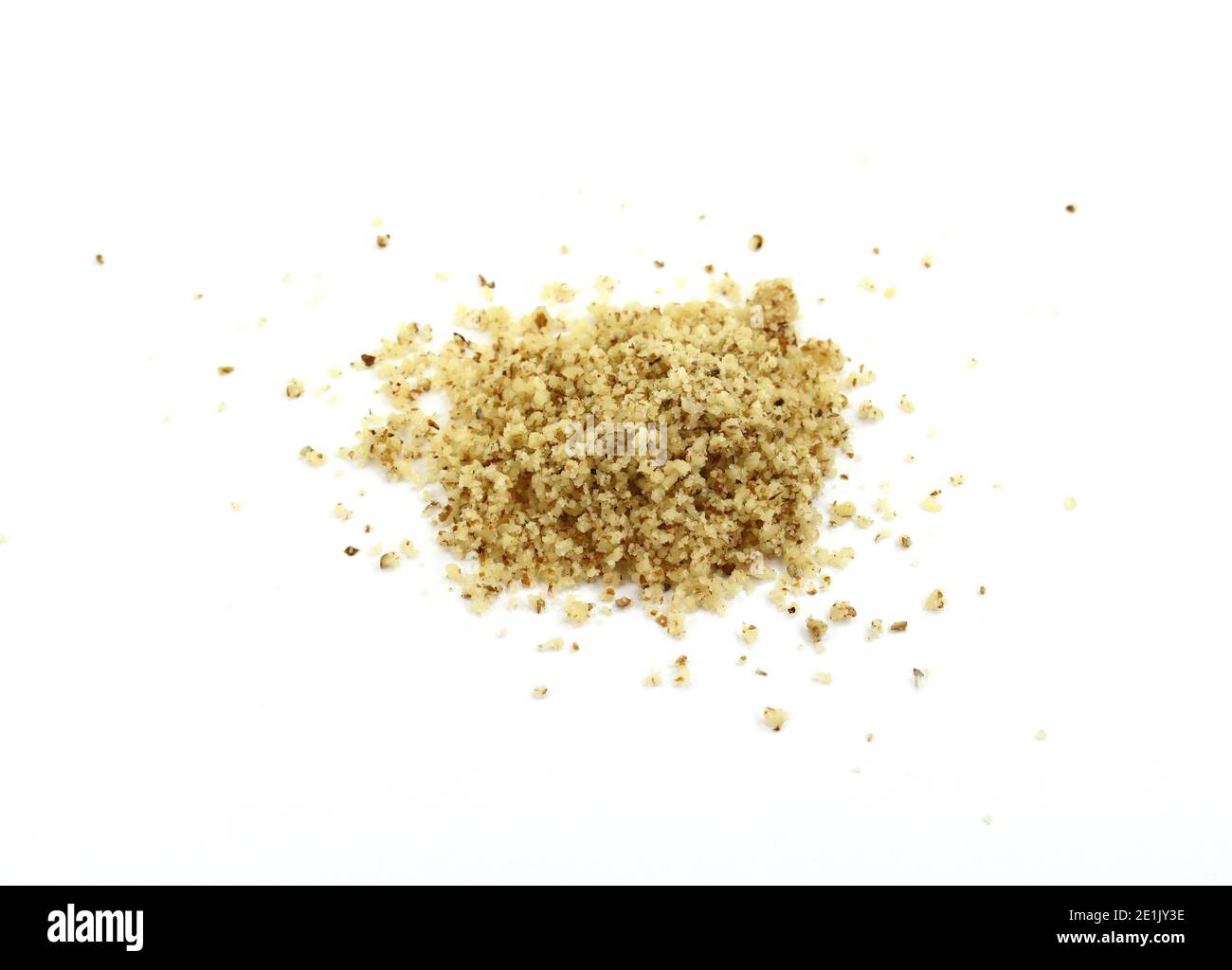 Ground walnuts powder on white. Chopped walnuts pile isolated on white ...