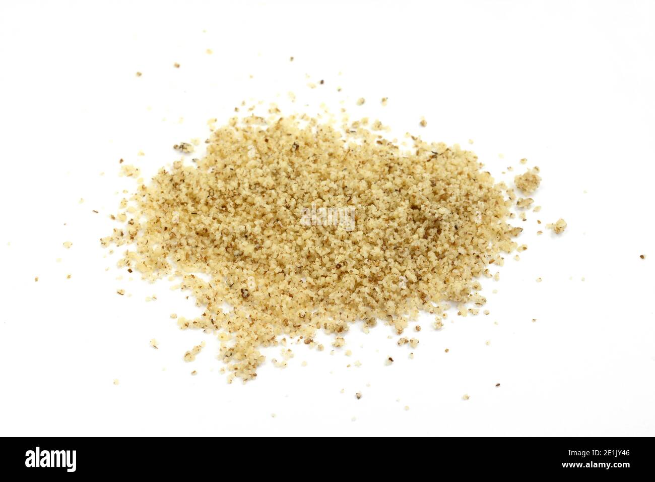 Ground walnuts powder on white. Chopped walnuts pile isolated on white ...