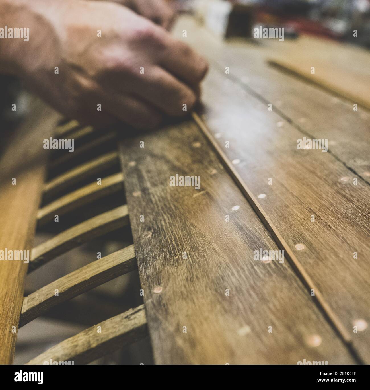 Restoring an old sailing dinghy with traditional tools Stock Photo - Alamy