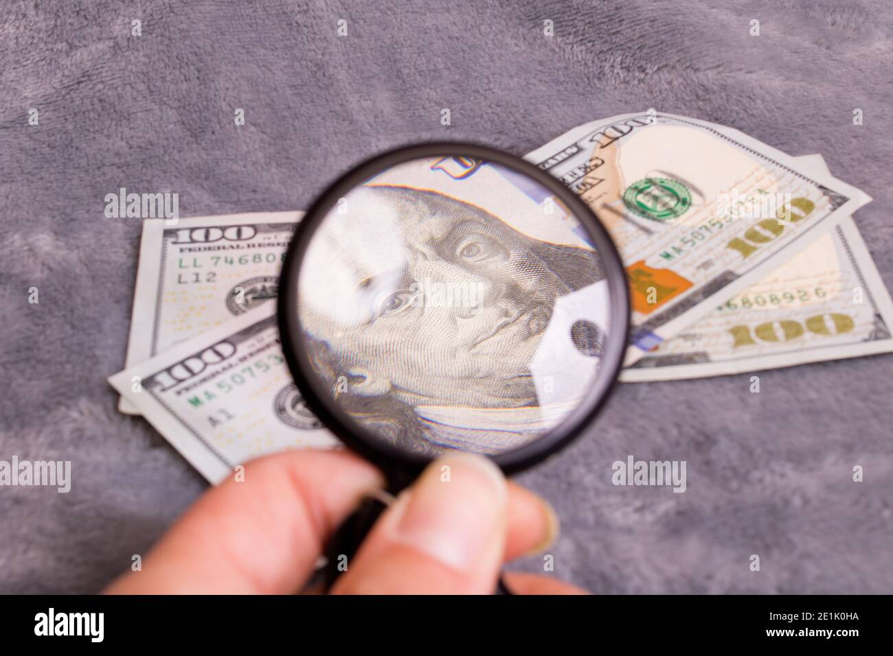 Checking authenticity hi-res stock photography and images - Alamy