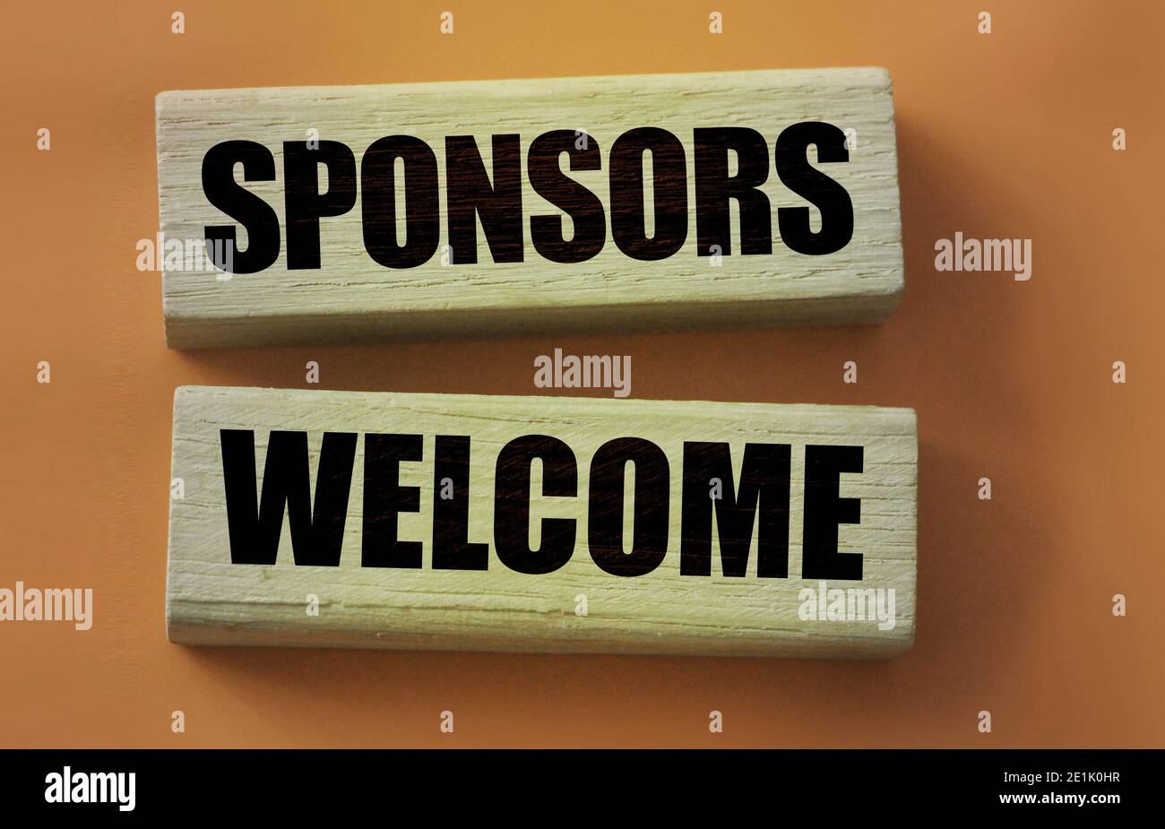 SPONSORS WELCOME on wooden blocks. Sponsorship donation support ...