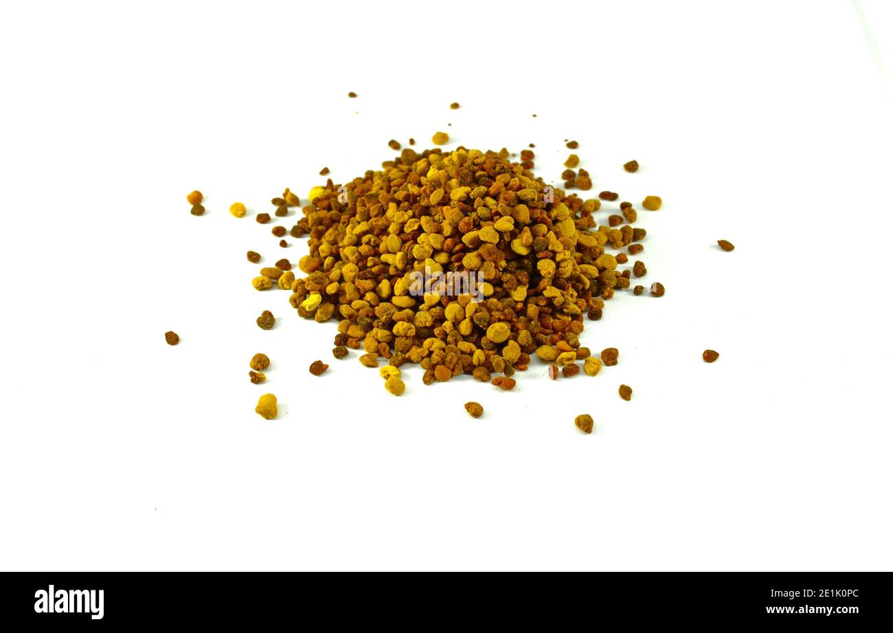 Pile of bee pollen isolated on white Stock Photo - Alamy