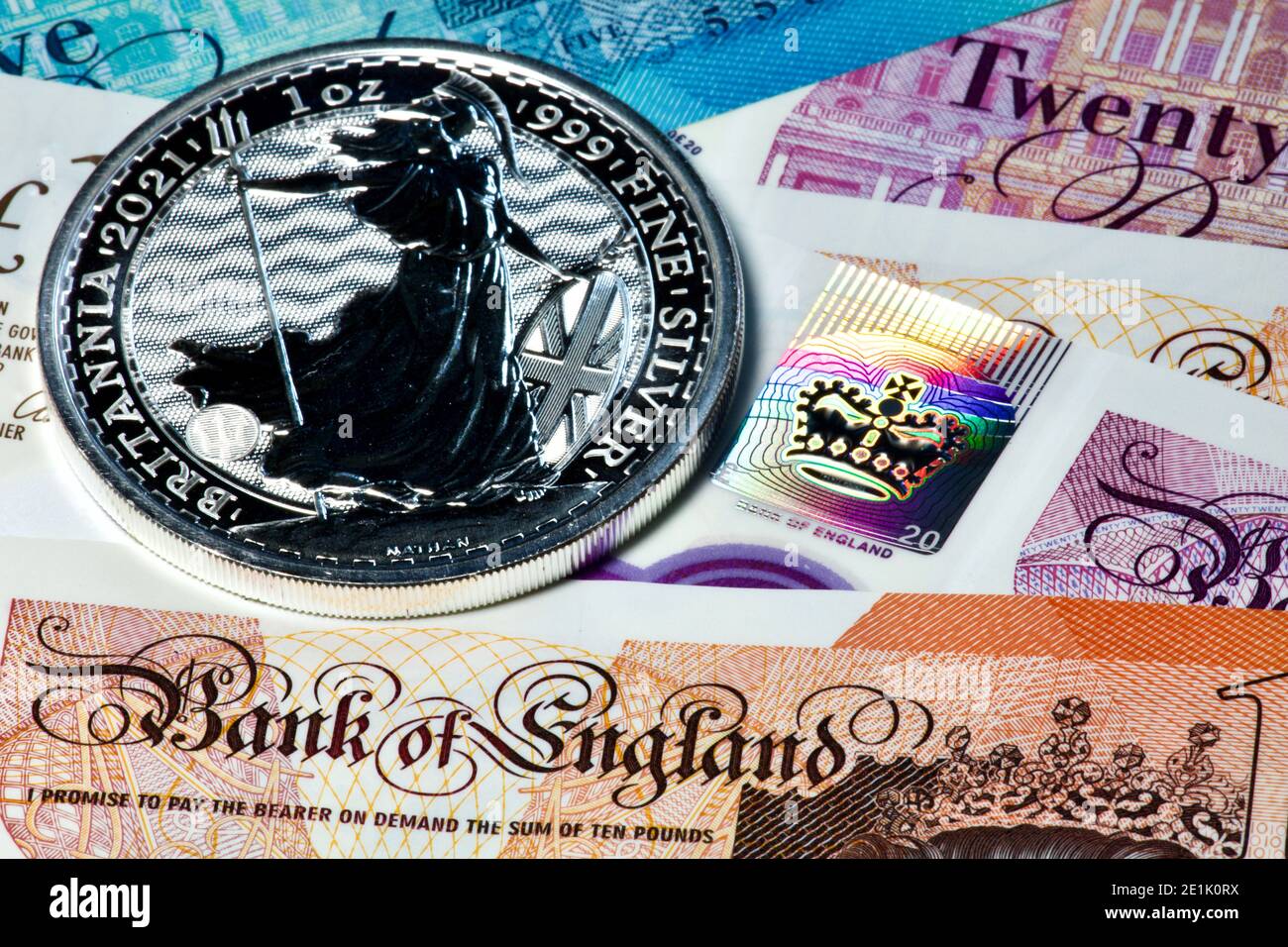 2021 Britannia One Ounce Silver Coin on the new polymer banknotes Stock ...