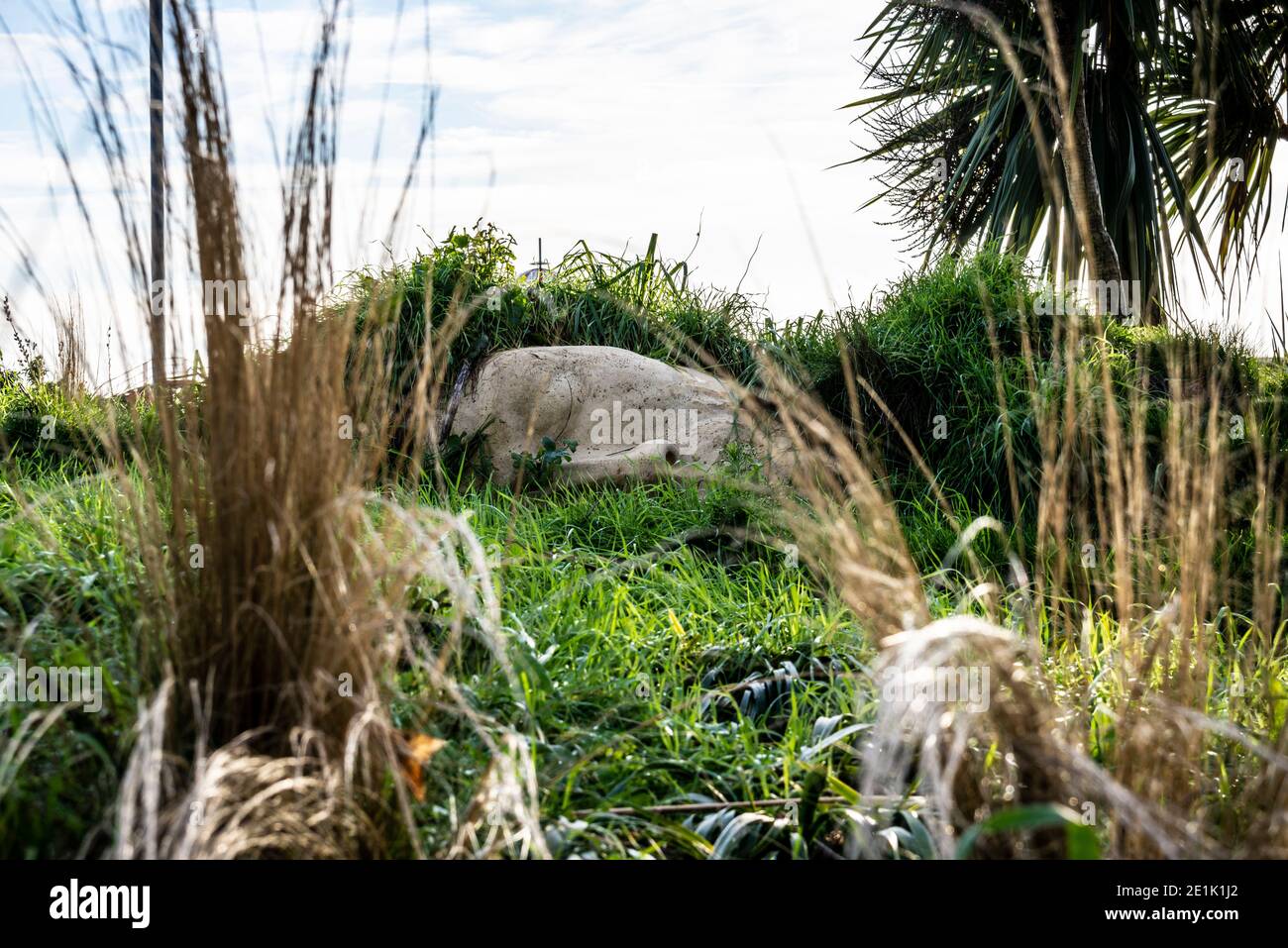 Sleeping giant figure in The Shrubbery, Cliff Gardens in Southend on ...