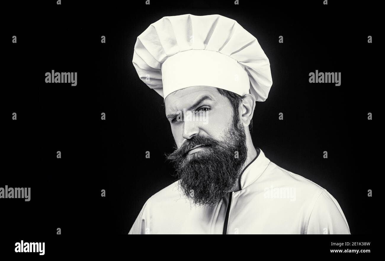 Cook hat. Confident bearded male chef in white uniform. Serious cook in ...
